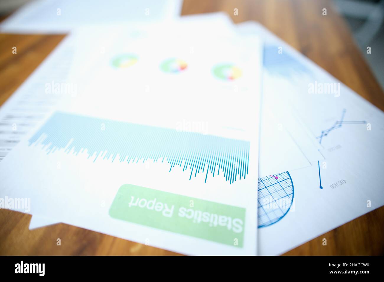A statistical report with a diagram lies on the table Stock Photo - Alamy