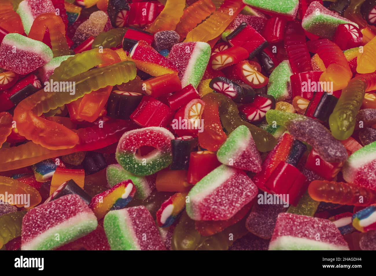 Assorted tasty gummy candies. Top view. Jelly sweets background Stock ...