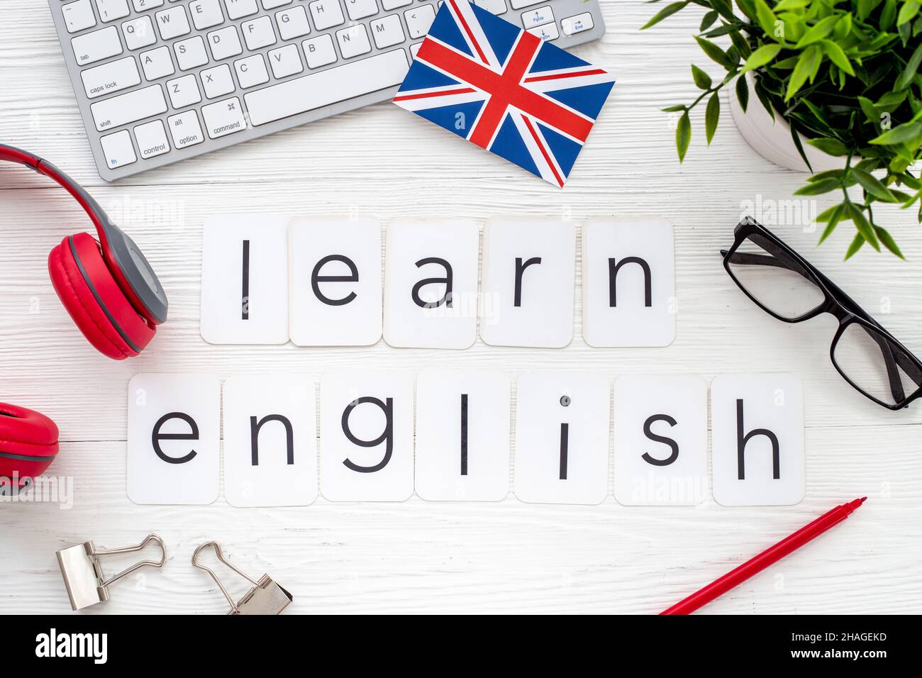 Student table desk - learning English lessons concept Stock Photo - Alamy