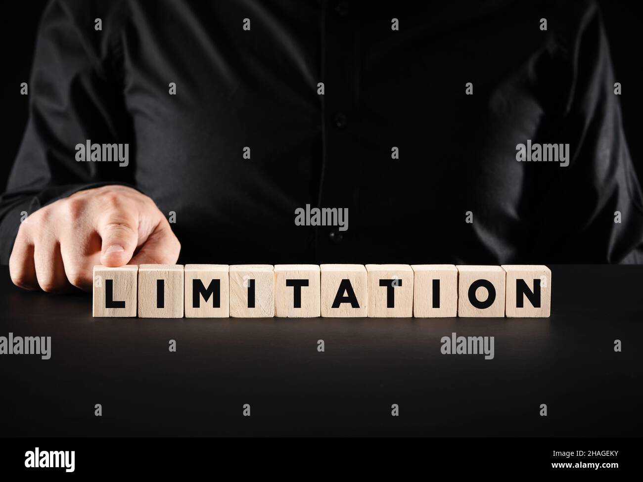 Business limitation or boundaries concep. Businessman presses the ...
