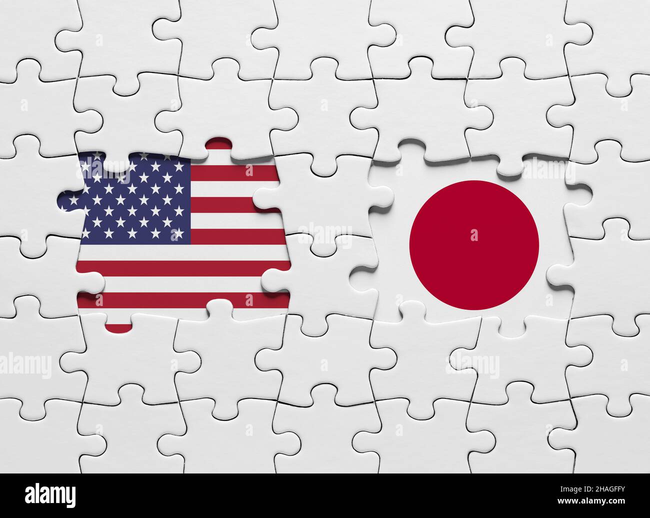 Jigsaw puzzle with the national flags of United States of America and ...