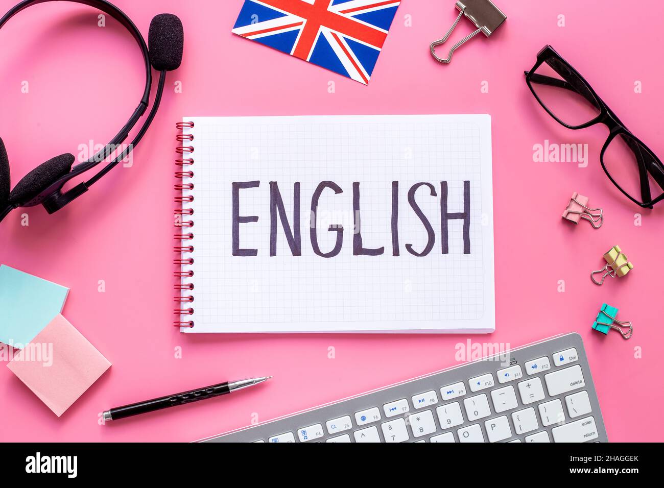 Student table desk - learning English lessons concept Stock Photo - Alamy