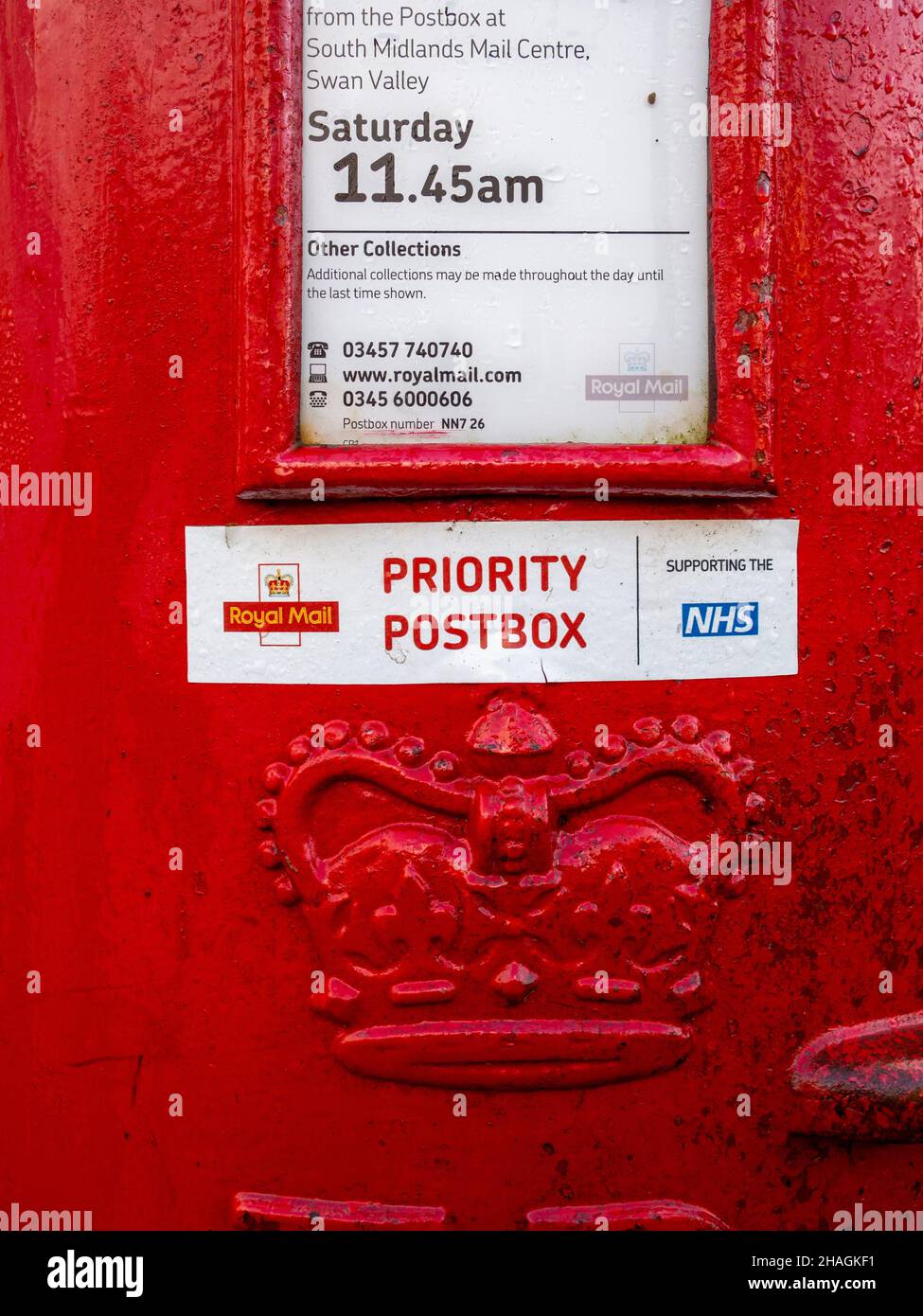Priority Postbox sticker on a Royal Mail postbox, used for posting ...