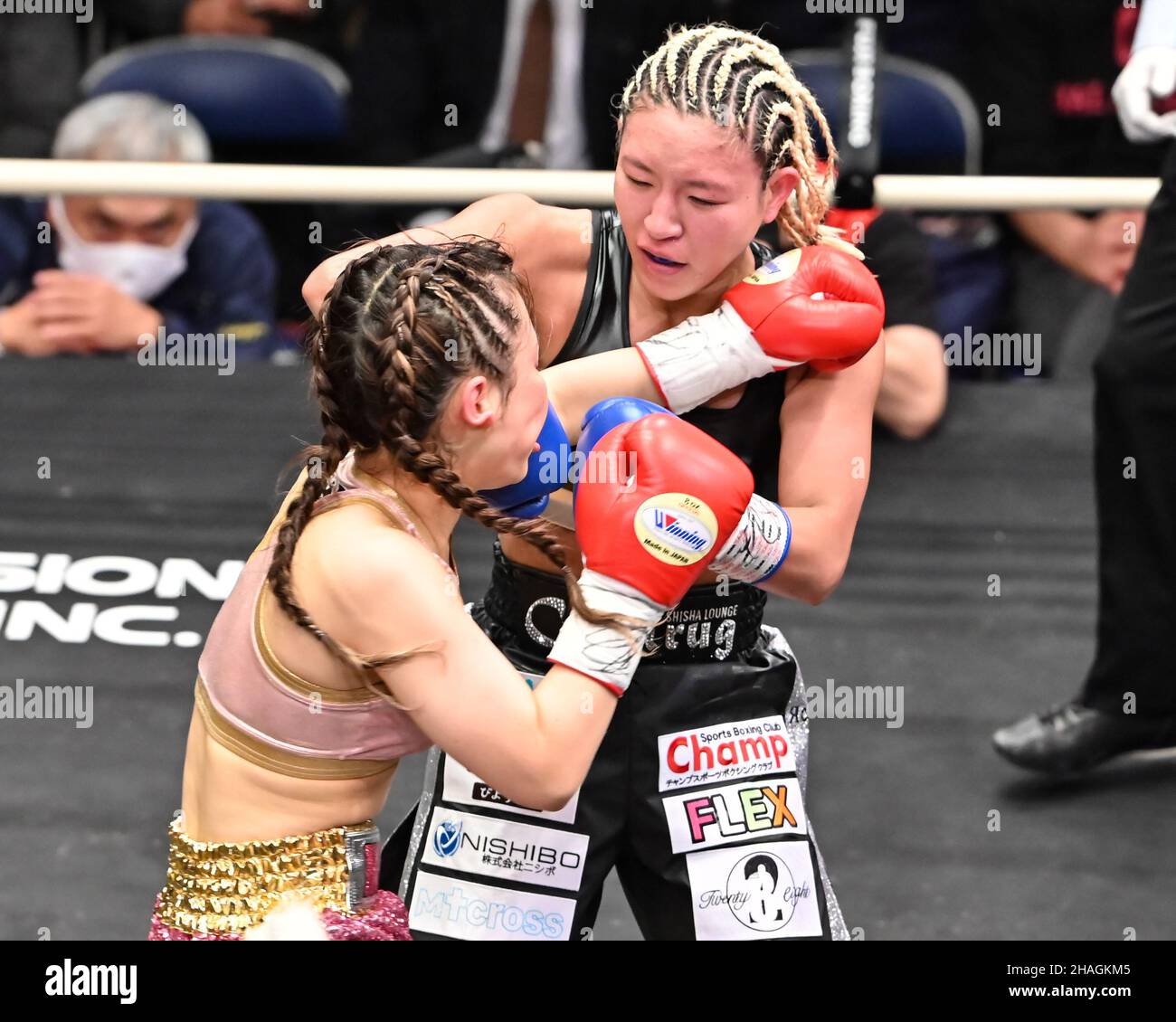 Tokyo, Japan. 9th Dec, 2021. Nanako Suzuki (red gloves) and Sayo Segawa ...
