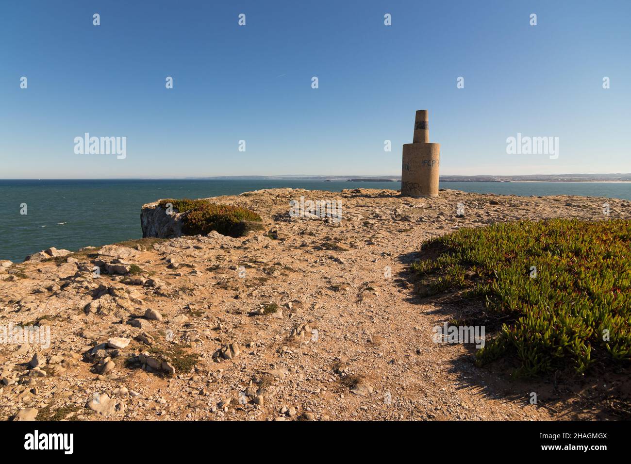 Lighthouse on the cliff during sunrise Stock Photo - Alamy