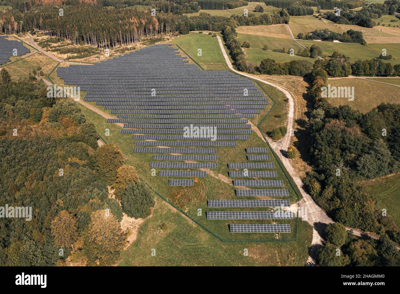 Aerial view of a solar farm surrounded by fields Stock Photo - Alamy