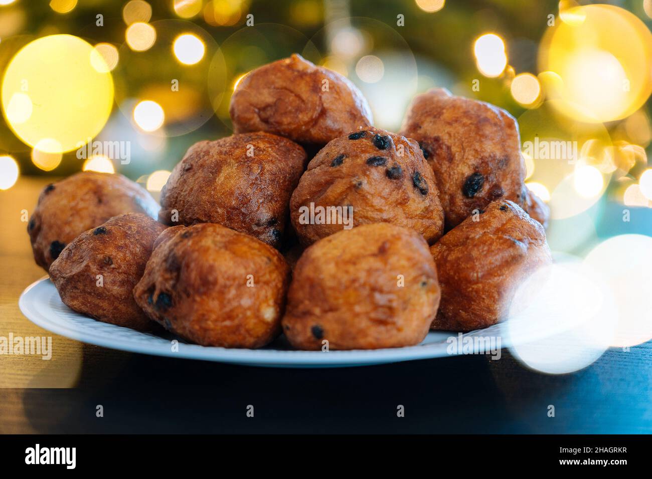 'Oliebollen', traditional Dutch pastry for New Year's Eve with sparkles ...