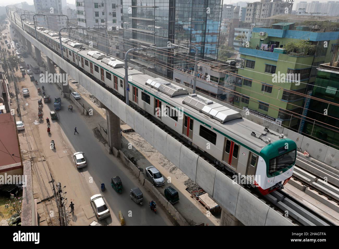 Dhaka, Bangladesh - December 12, 2021: The Metro rail in Dhaka is running experimentally on the ...