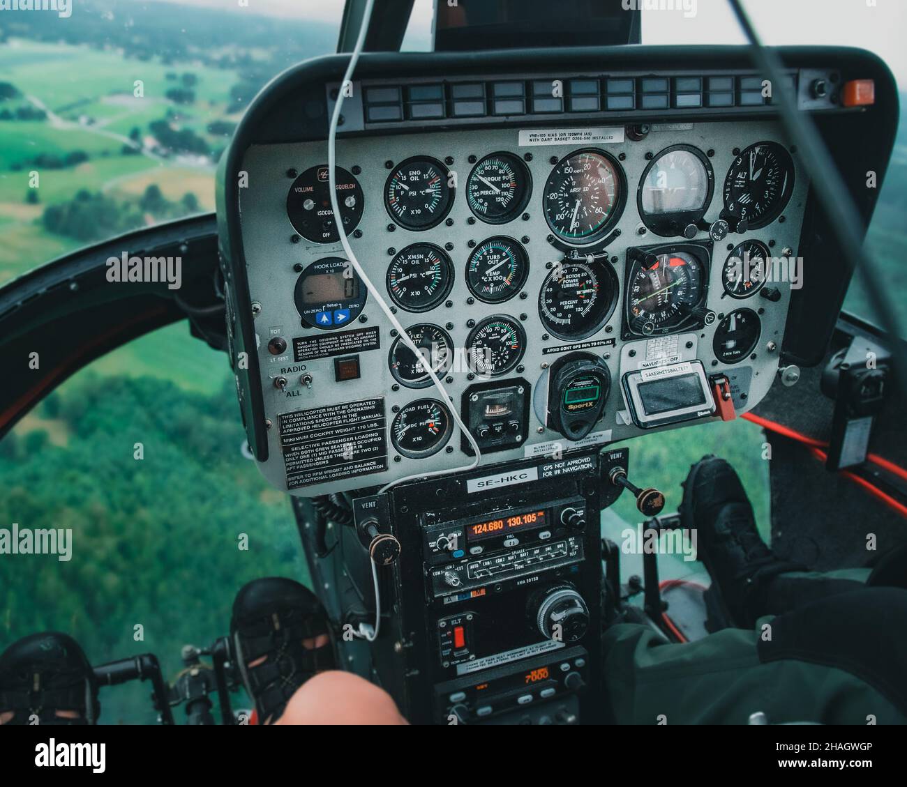Interior of a helicopter flying over the hills Stock Photo - Alamy