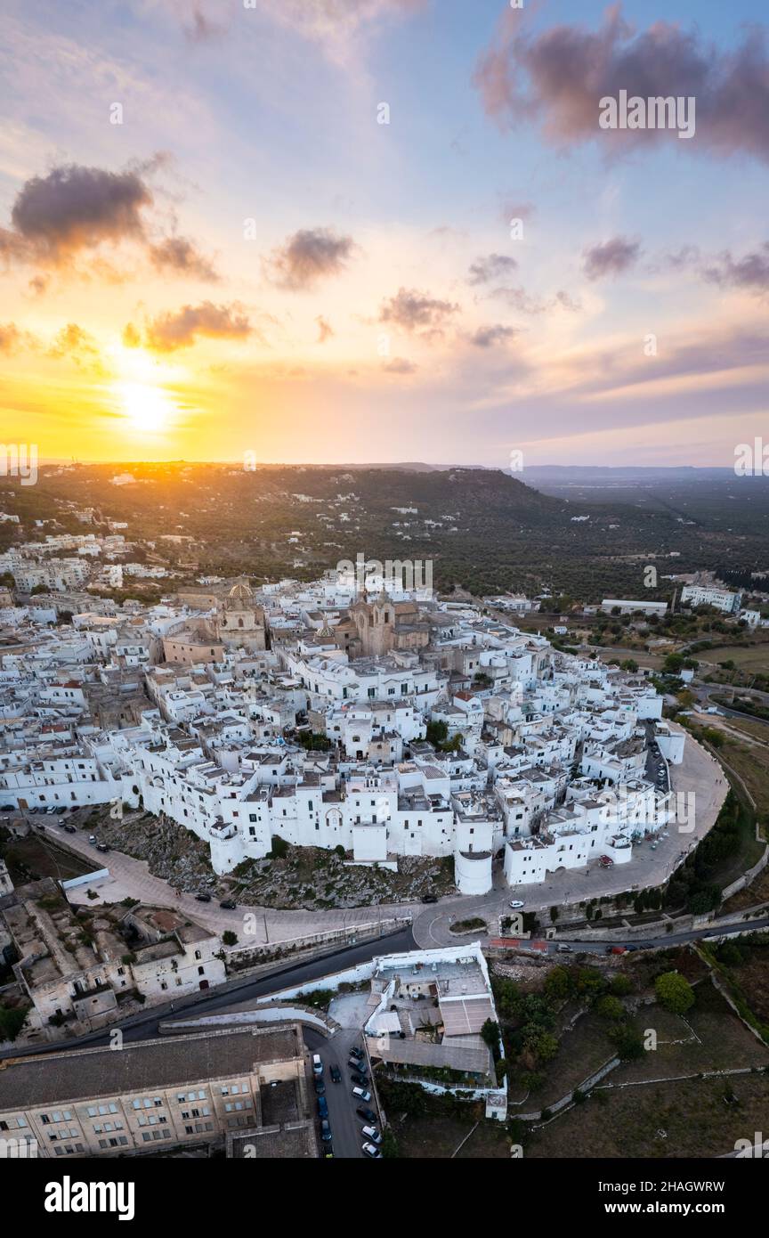 Aerial view of the white town of Ostuni at sunset. Brindisi district ...