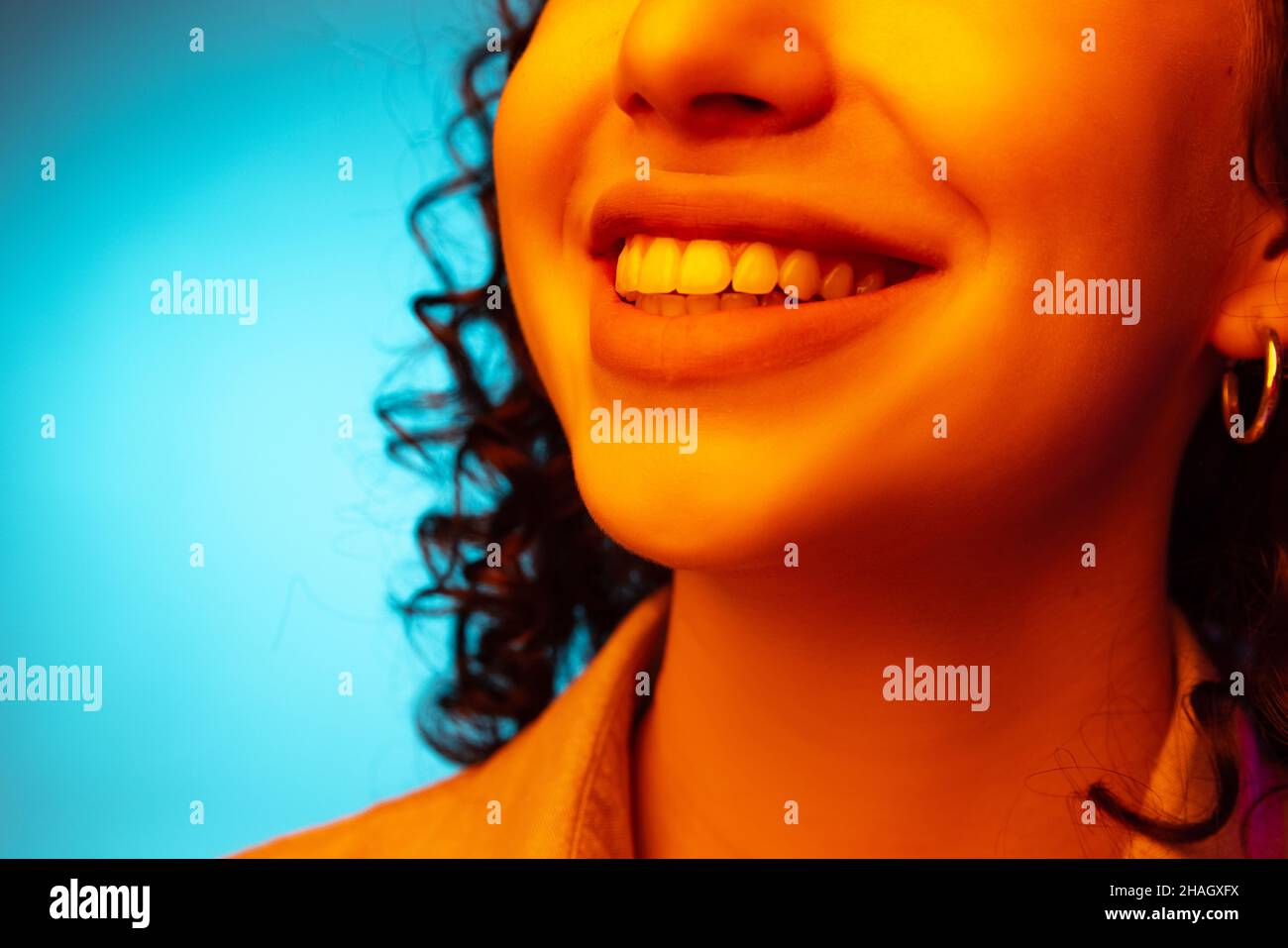 Close-up female cropped face, lips and straight white teeth isolated on ...