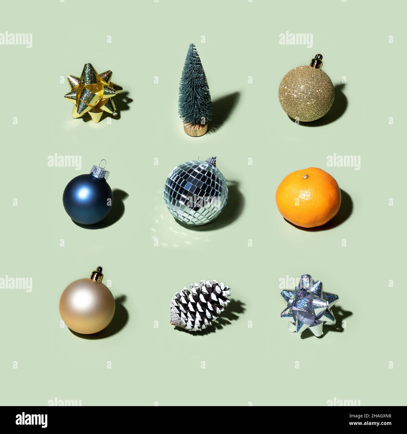 Random christmas objects pattern on basil green background. Tree ...