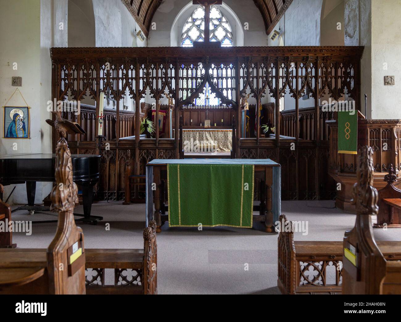 Carved wooden rood screen with altars in Blundeston church, Suffolk ...