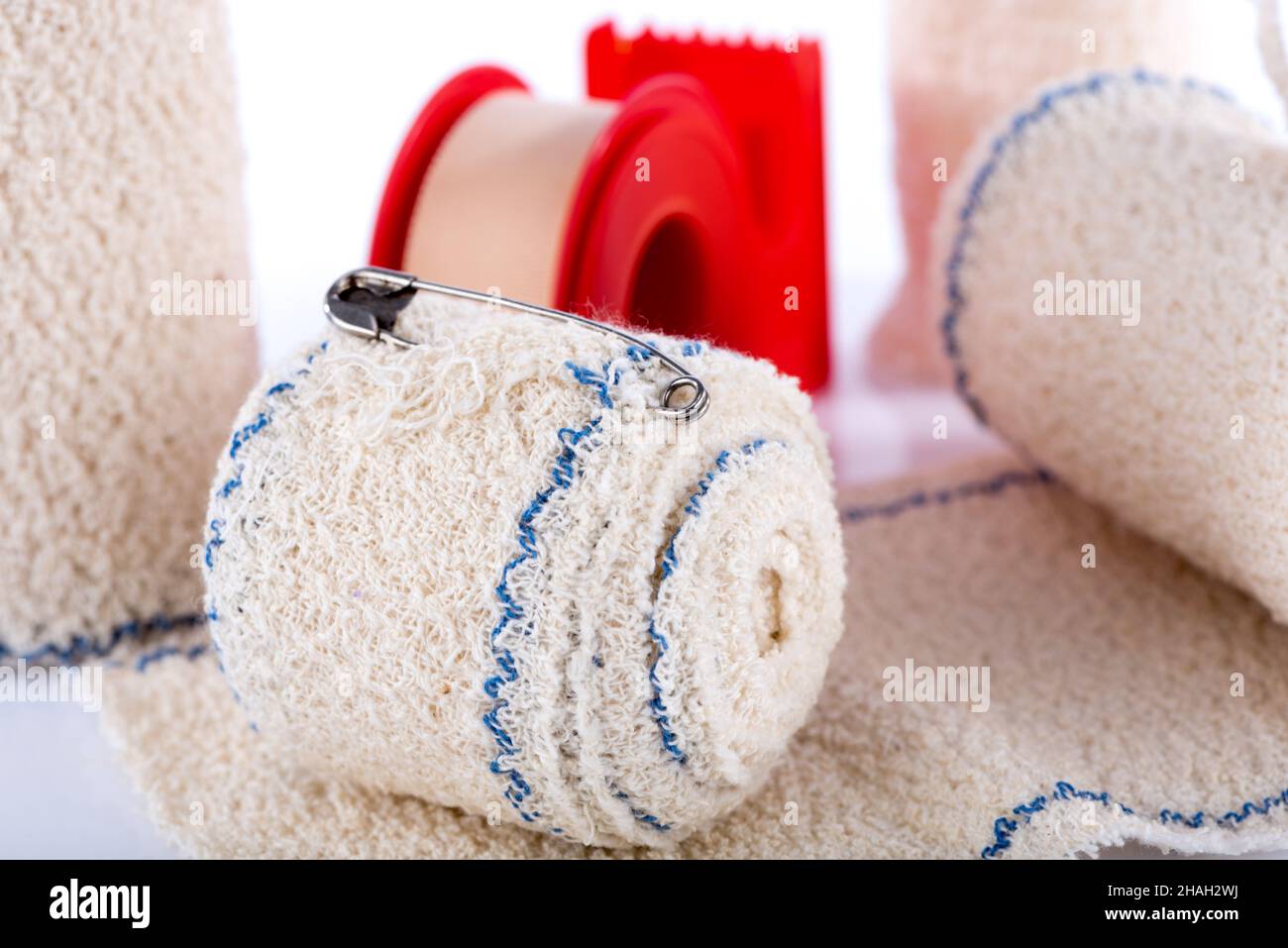 Medical bandages with red sticking plaster Stock Photo - Alamy
