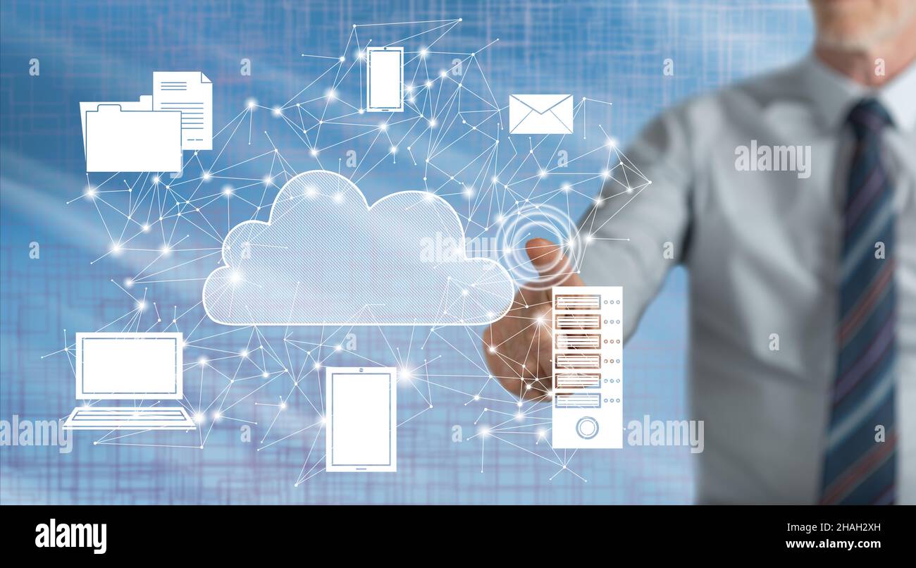Man touching a cloud computing concept on a touch screen with his ...