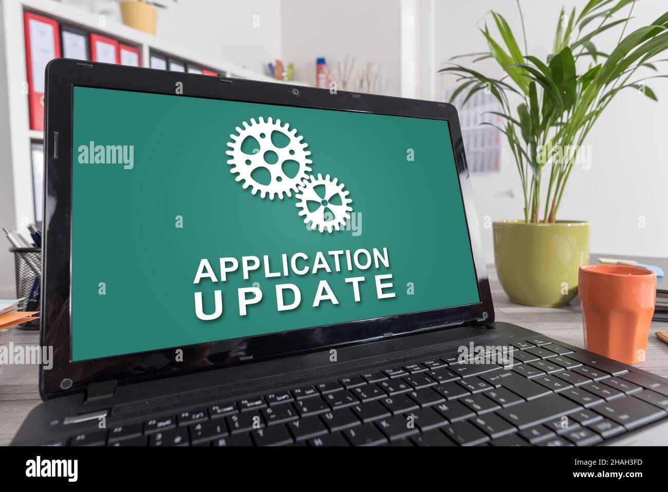 Laptop screen with application update concept Stock Photo - Alamy