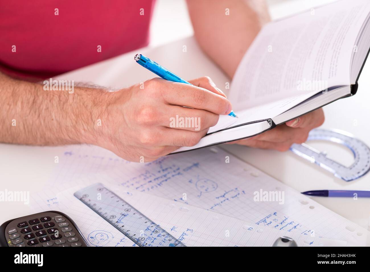 Student working for exams Stock Photo - Alamy
