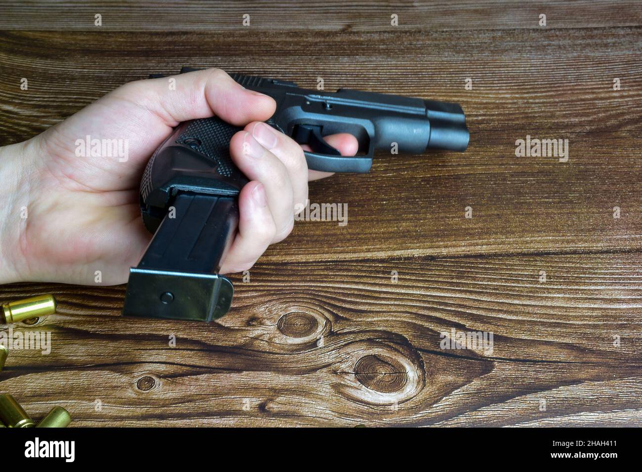 Mickey Mouse Hands Holding A Gun