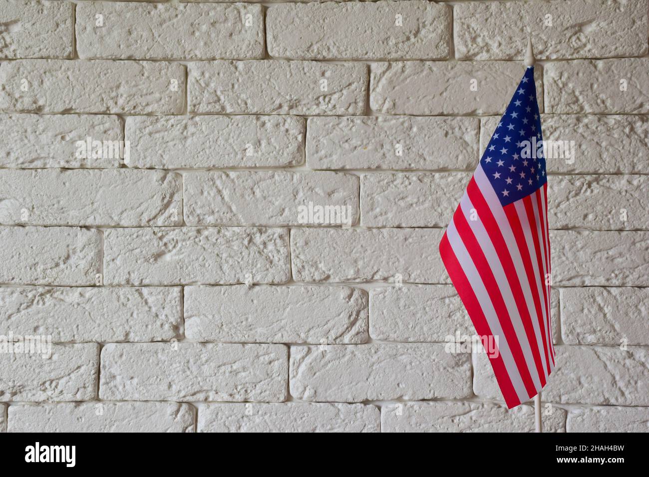 On the right side of the frame is the USA flag against the background ...