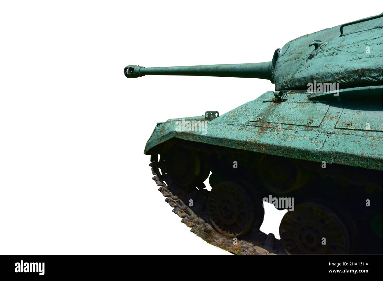 The front of an old Soviet heavy tank is photographed from the side ...