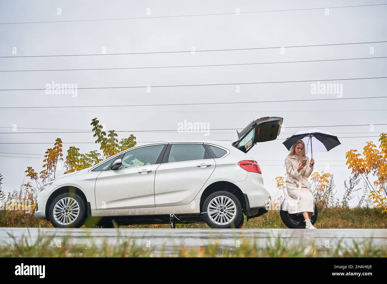 Car punctured hi-res stock photography and images - Alamy