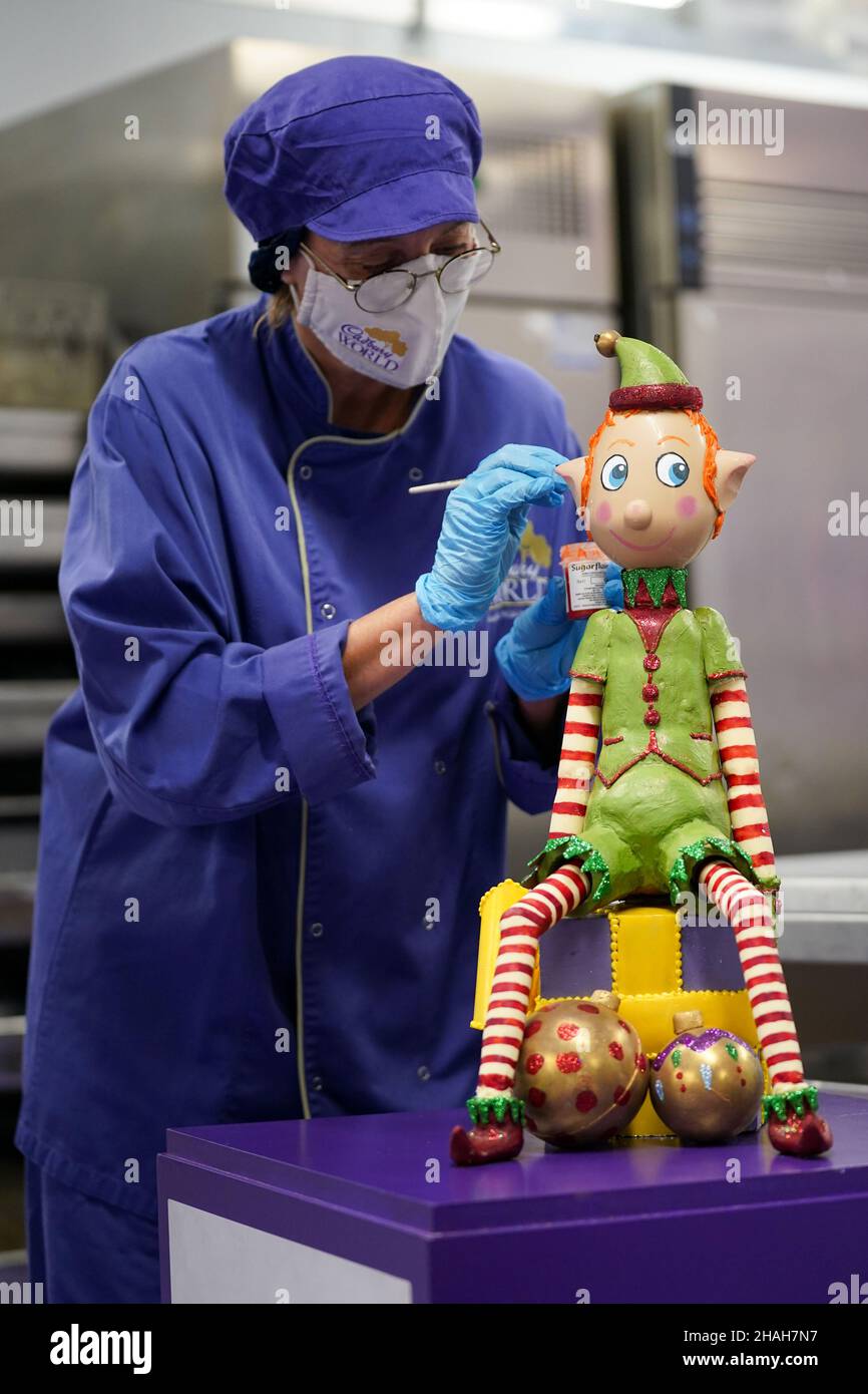 Chocolatier Dawn Jenks adds the finishing touches to the Christmas elf ...