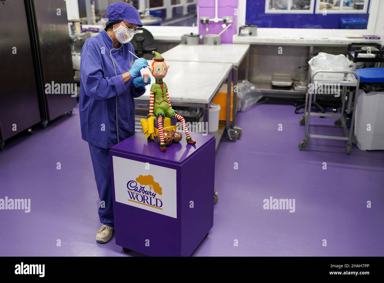 Chocolatier Dawn Jenks adds the finishing touches to the Christmas elf ...