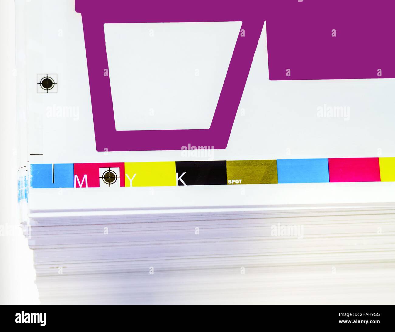 Offset printing. Sheets of printed products. CMYK press. Paper at the ...