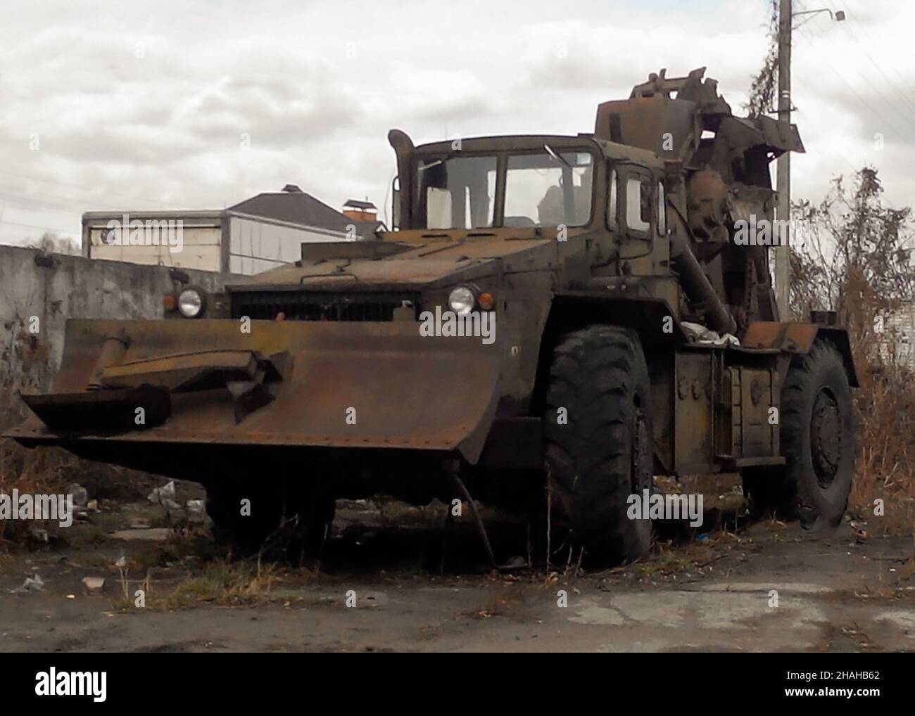 Military engineering earthmoving machine on wheels with trenching ...