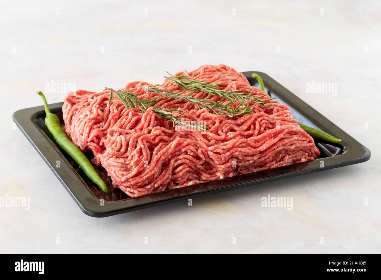 Raw Ground beef on white wooden background. Minced Meat background ...