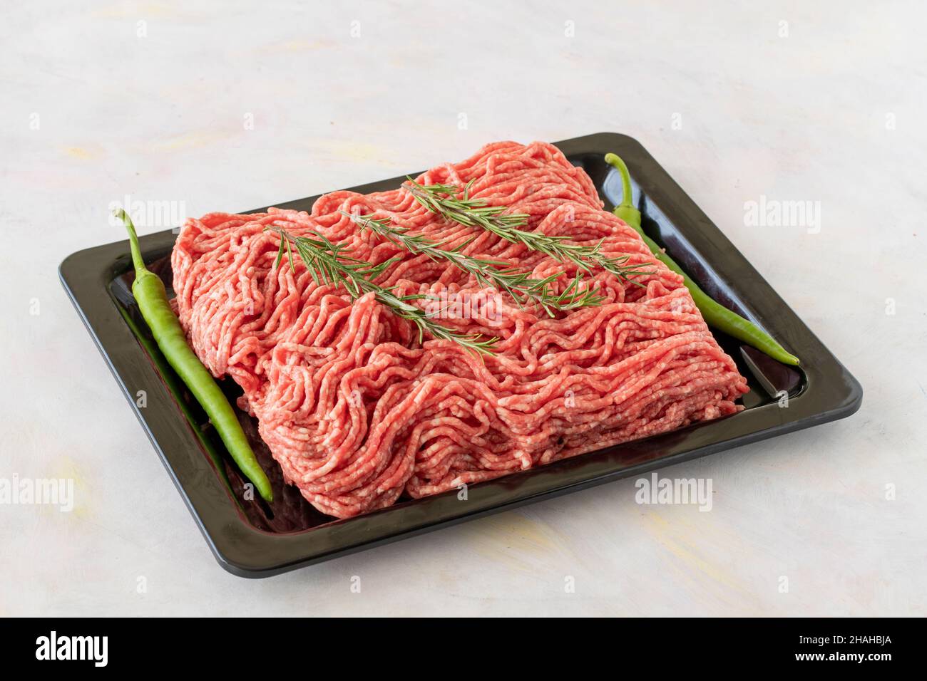 Raw Ground beef on white wooden background. Minced Meat background ...