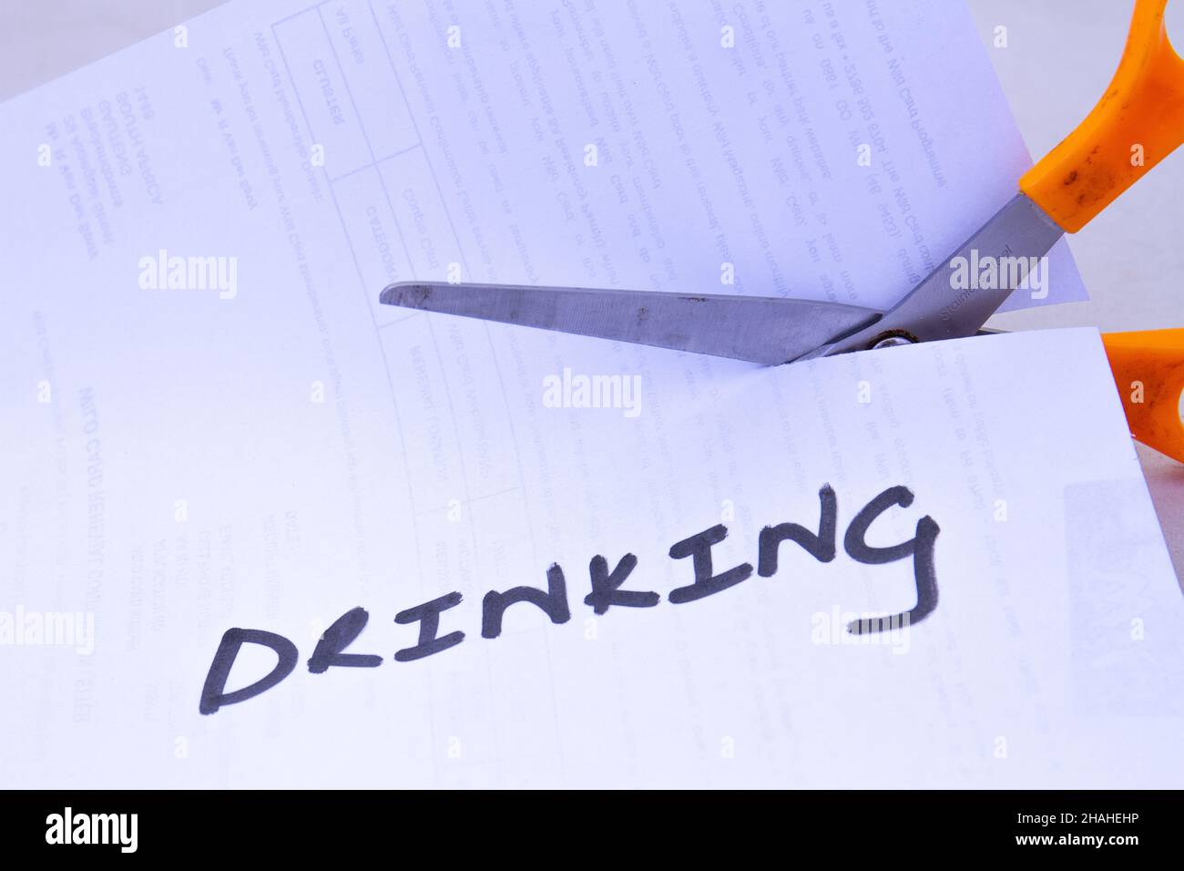 Cutting out drinking conceptual image Stock Photo - Alamy
