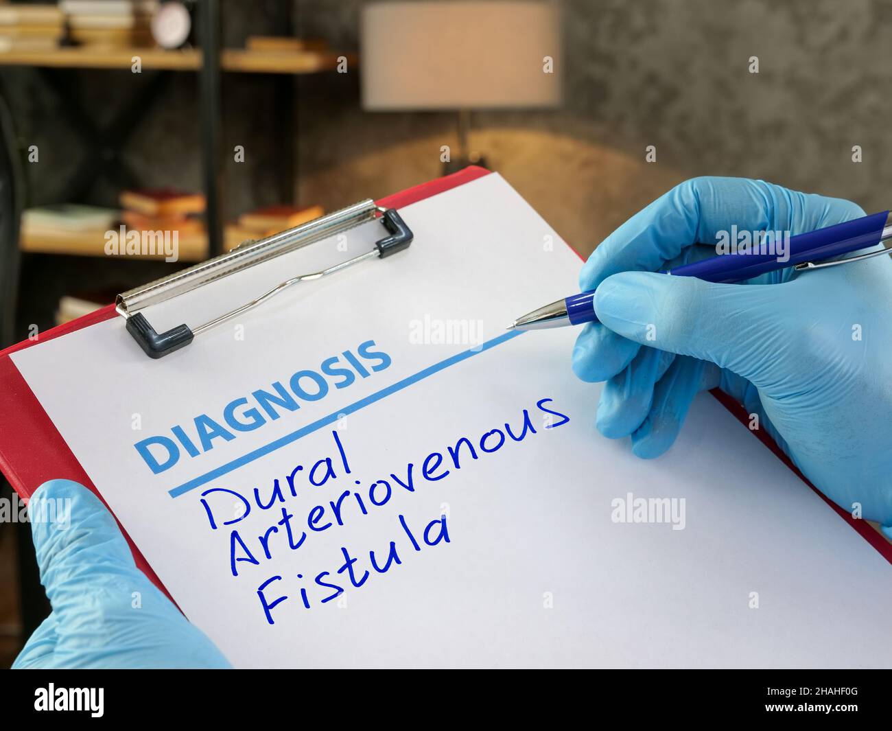 Doctor writes diagnosis Dural arteriovenous fistula DAVF Stock Photo ...