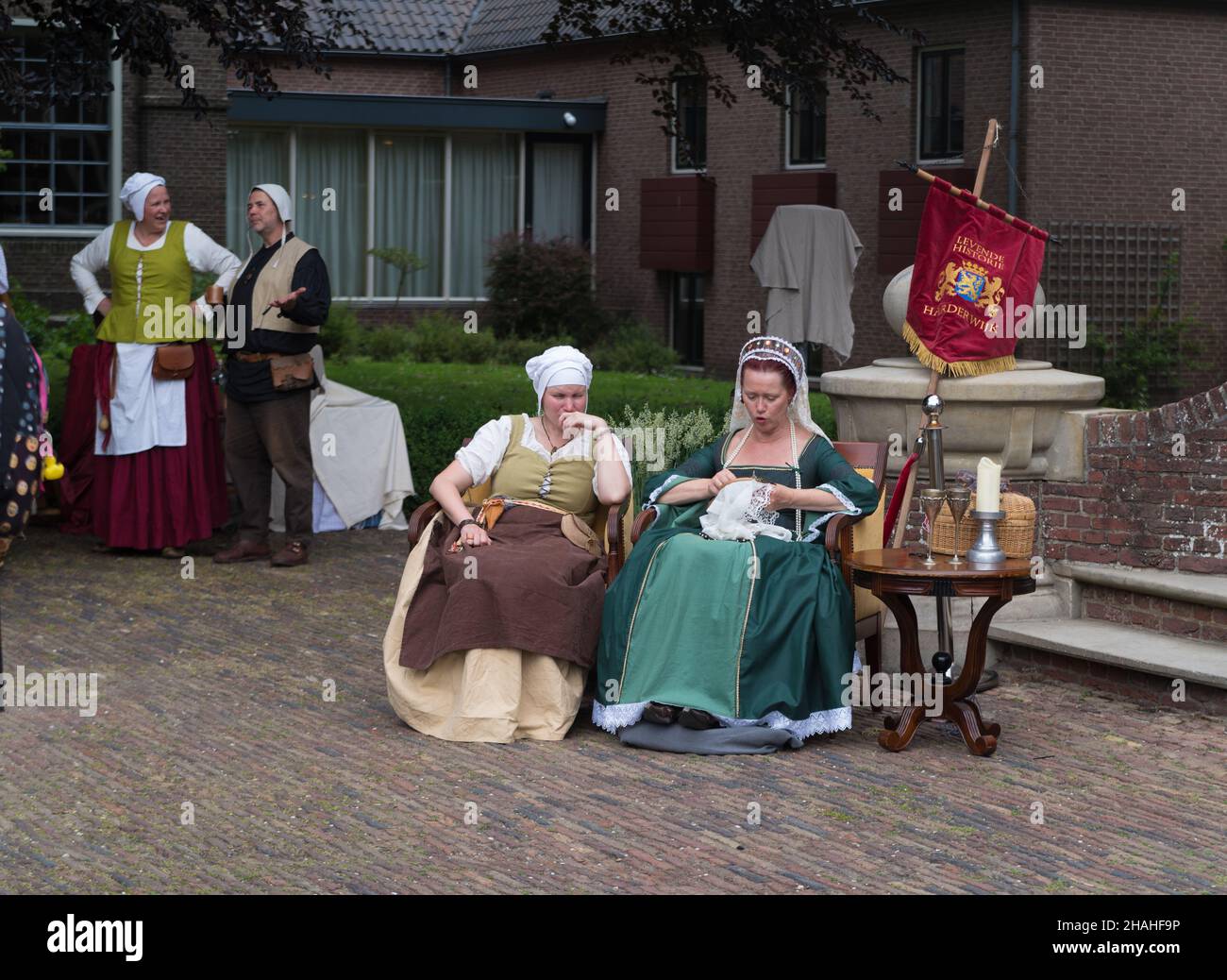 HIERDEN, NETHERLANDS - JUNE 10, 2019: Woman in medieval clothes at a ...