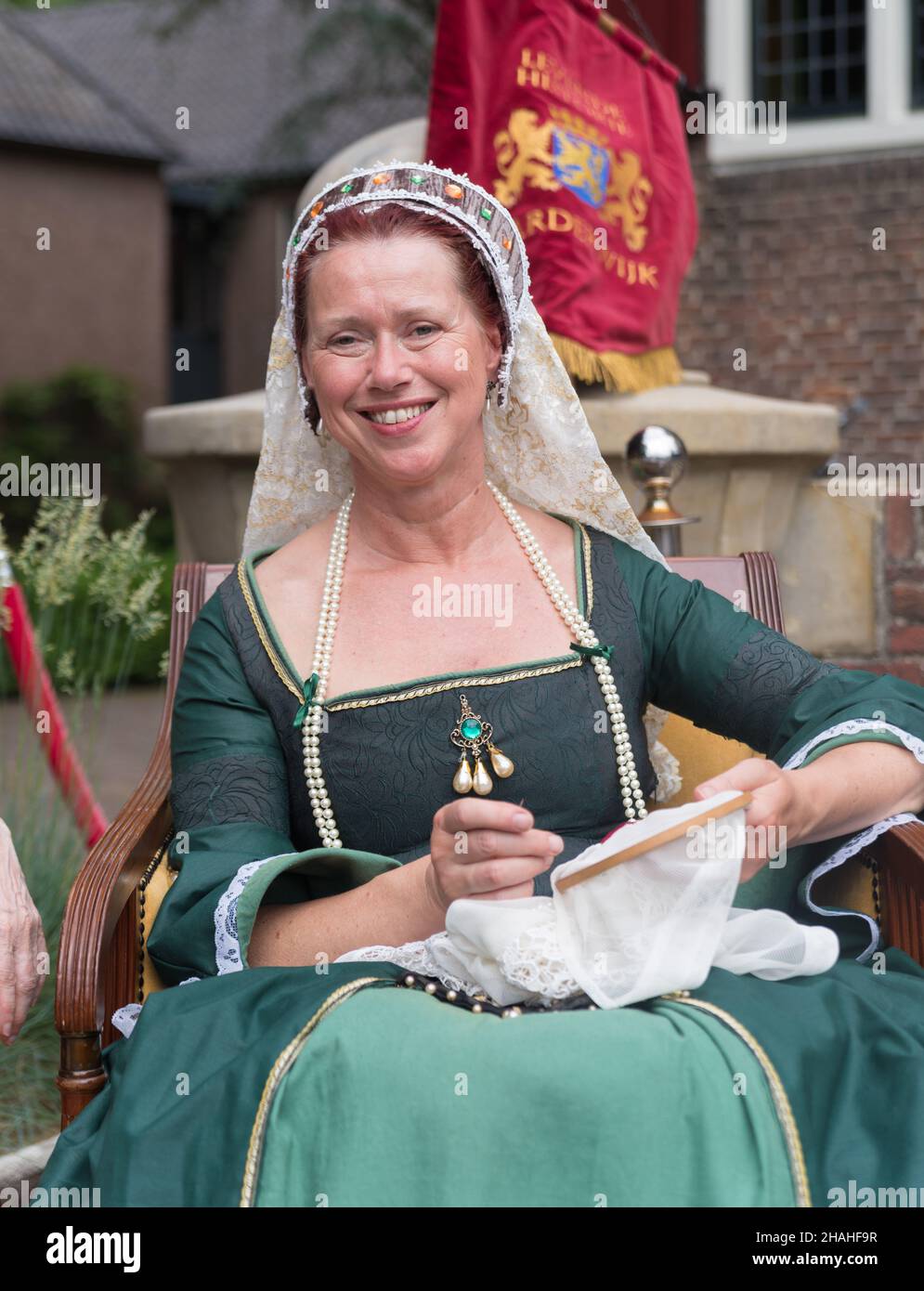 HIERDEN, NETHERLANDS - JUNE 10, 2019: Woman in medieval clothes at a ...