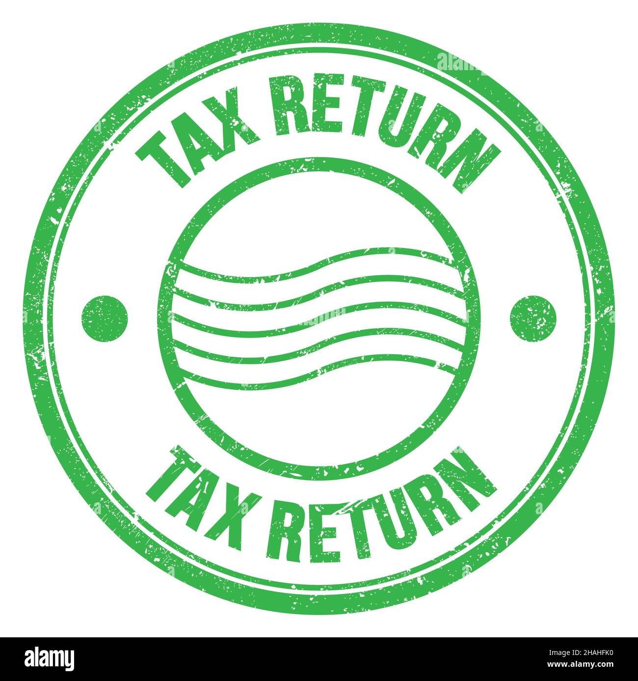 TAX RETURN word written on green round postal stamp sign Stock Photo ...