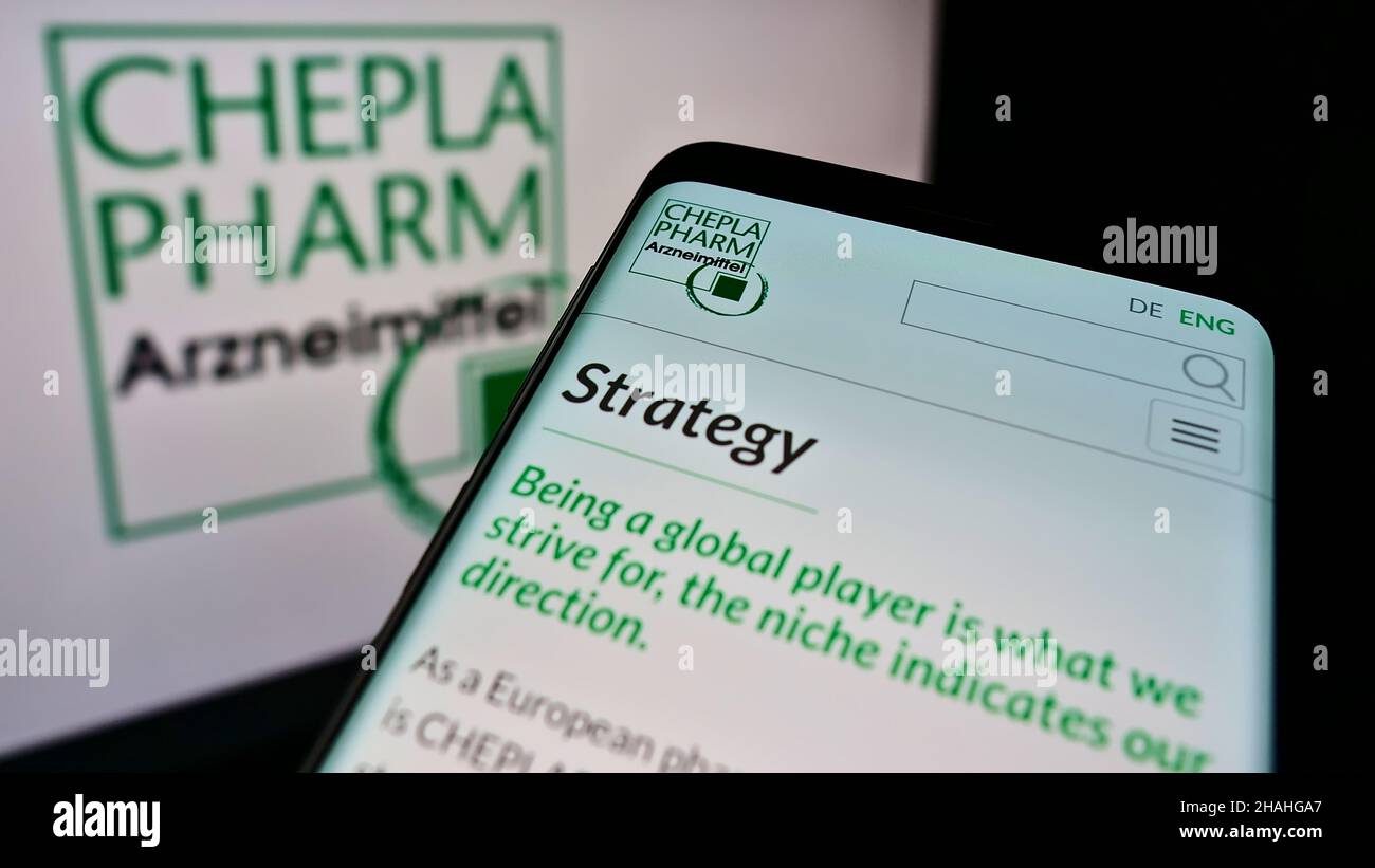 Mobile phone with webpage of German pharma company Cheplapharm ...