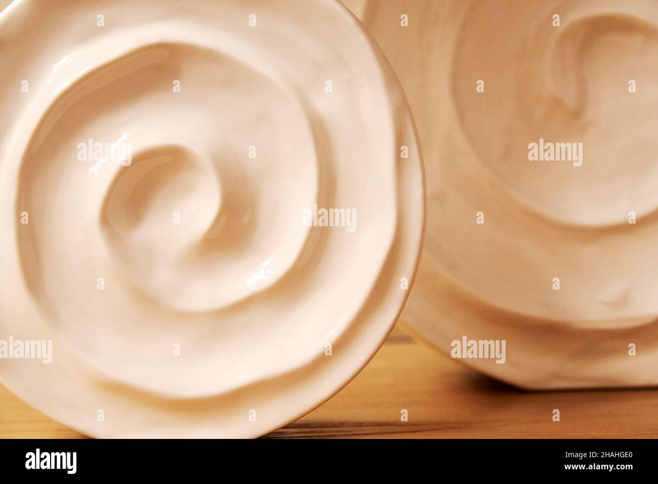 Decorative ceramic vases of a round shape on the table. Home interior ...