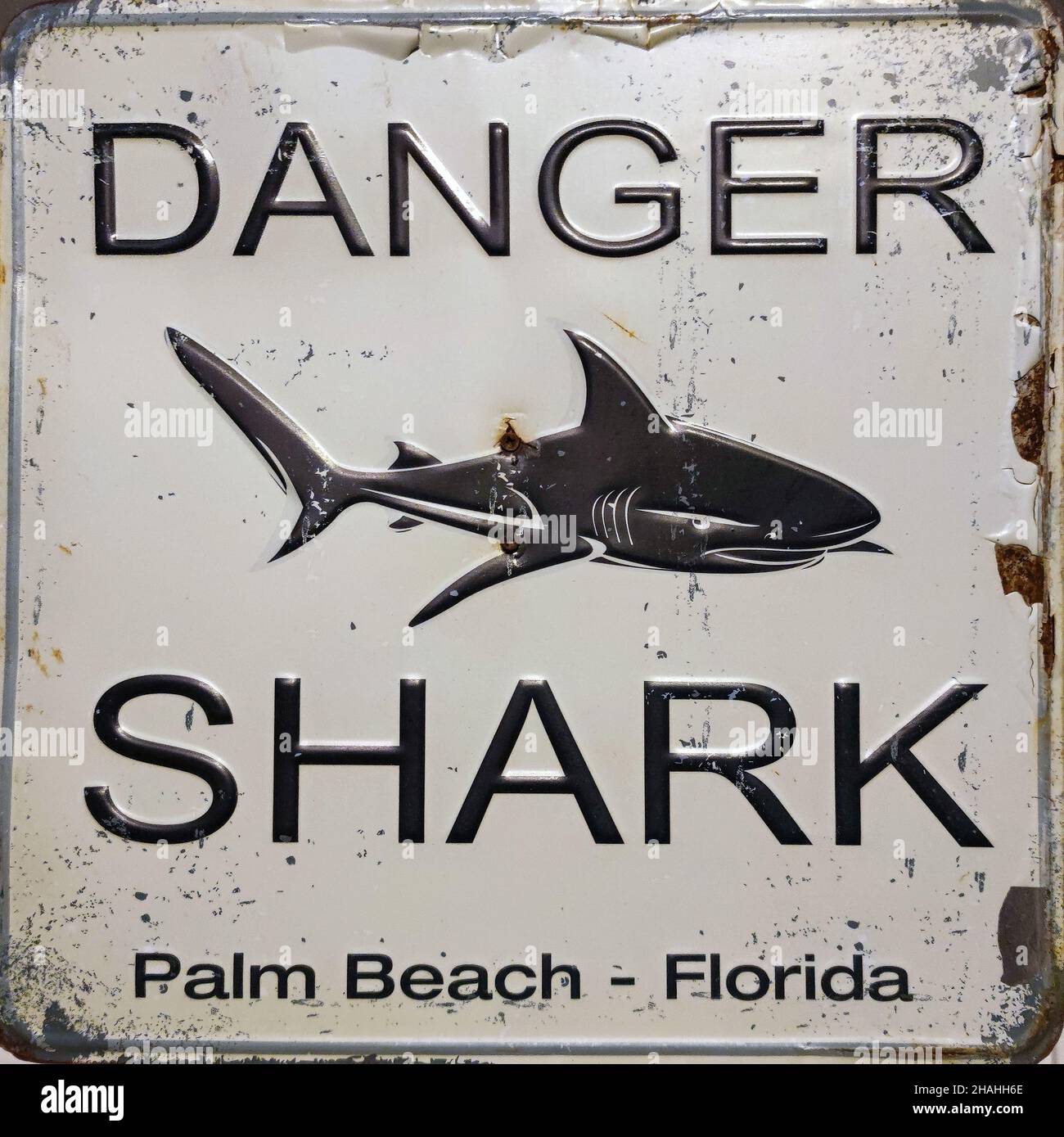 Florida Danger shake white metal Palm beach sign Stock Photo - Alamy