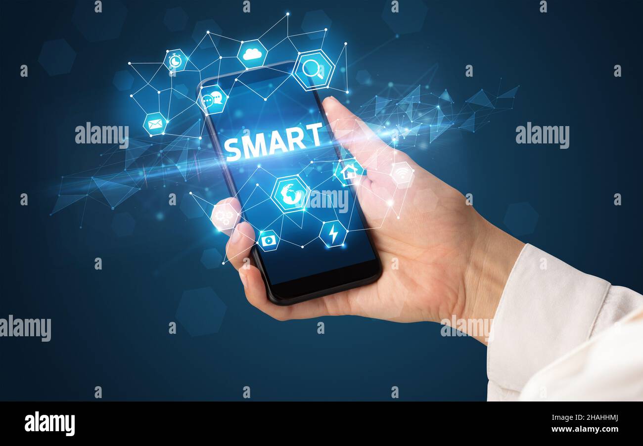 Hand using smartphone with technology concept Stock Photo - Alamy