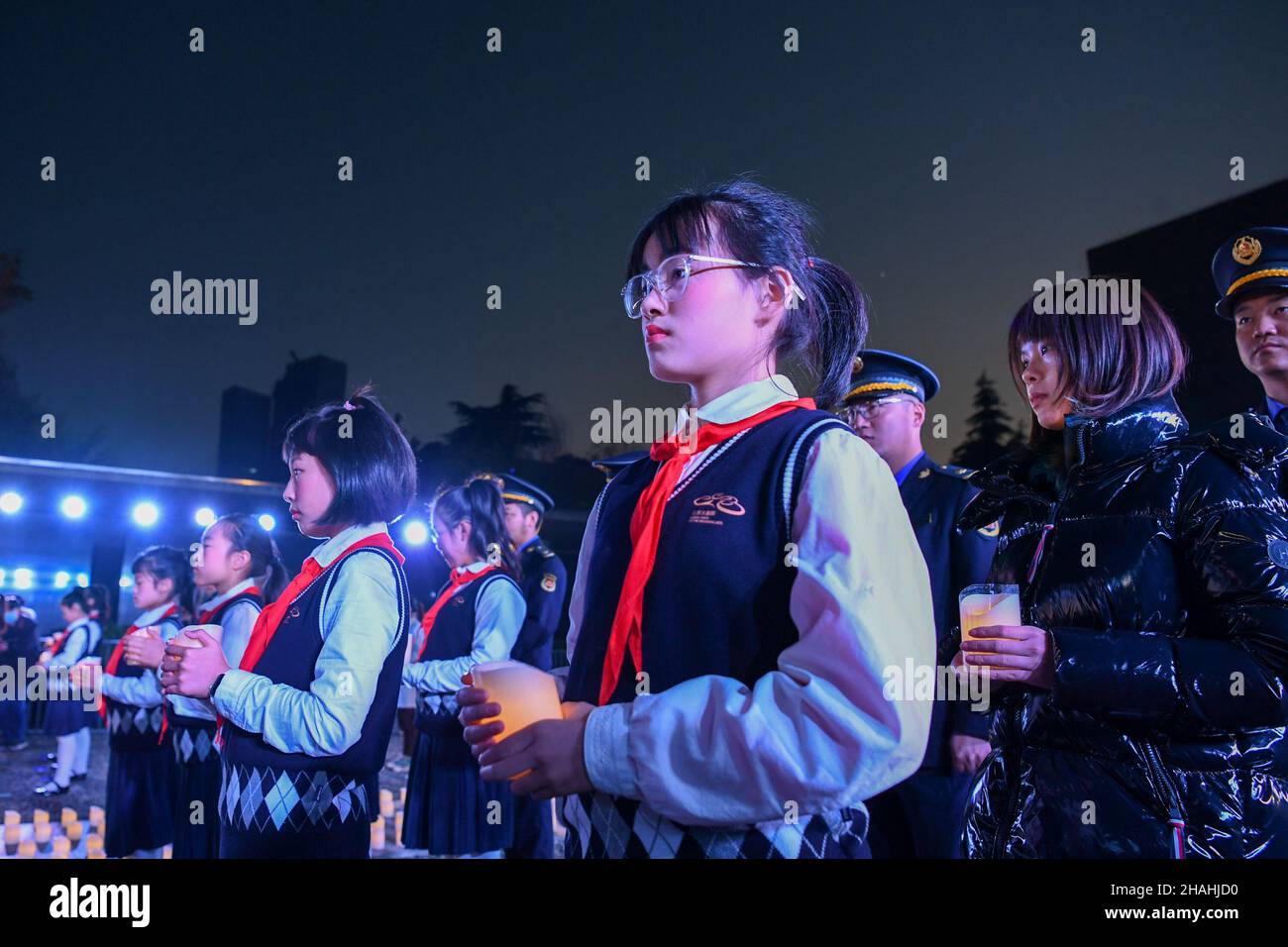 Nanjing, Dec. 13. 13th Dec, 1937. Students take part in a candlelight ...