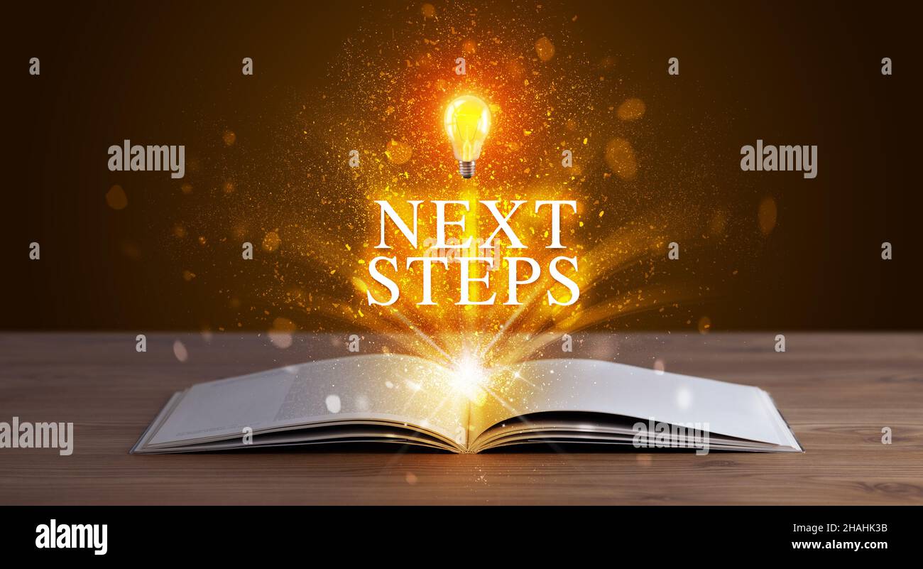 Educational inscription coming out from an open book Stock Photo - Alamy