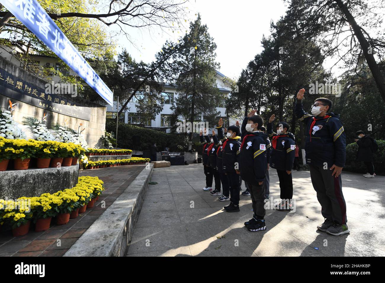 Nanjing, Dec. 13. 13th Dec, 1937. Students salute at a memorial ...