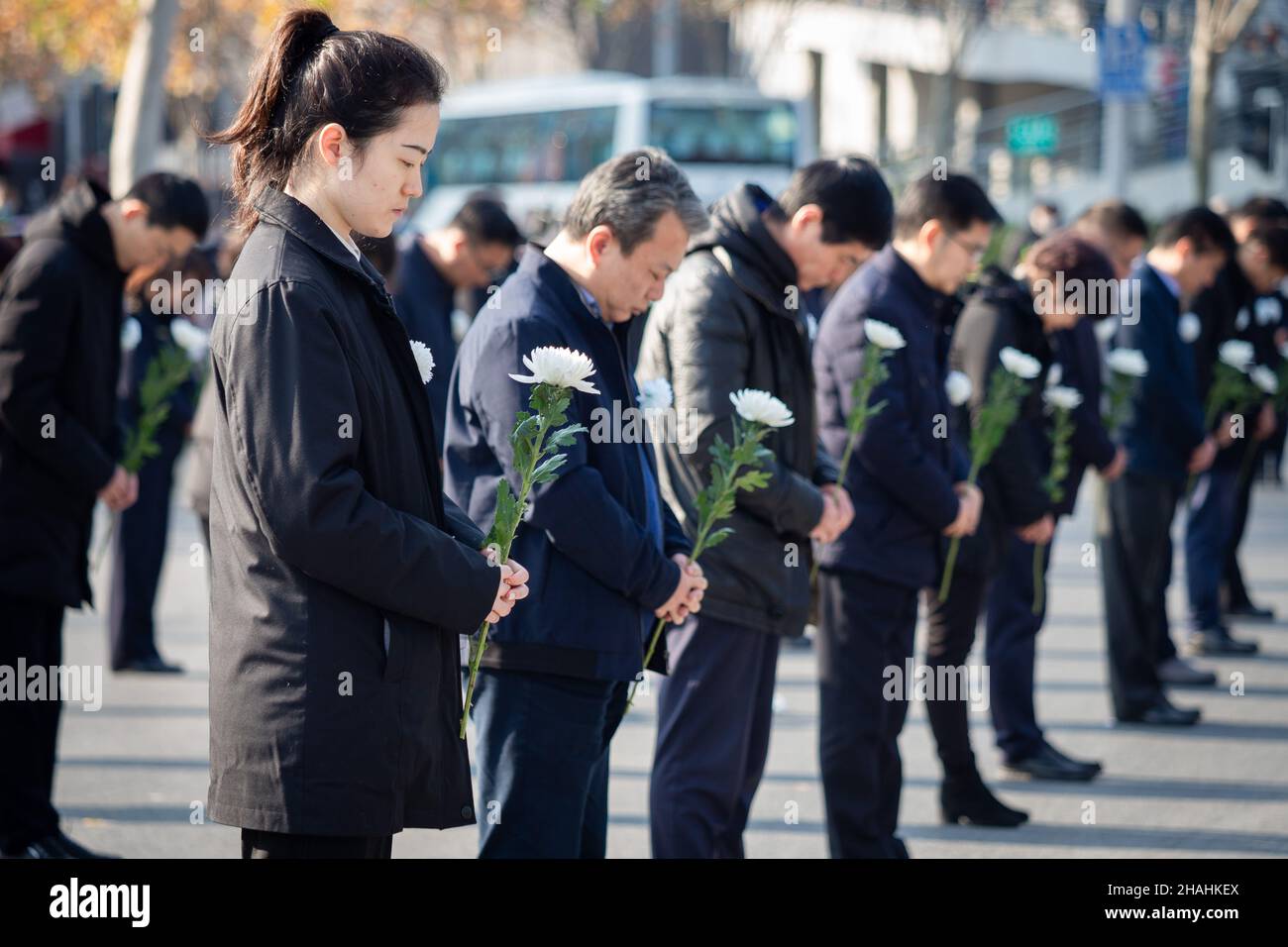 Nanjing, Dec. 13. 13th Dec, 1937. People observe a moment of silence in ...