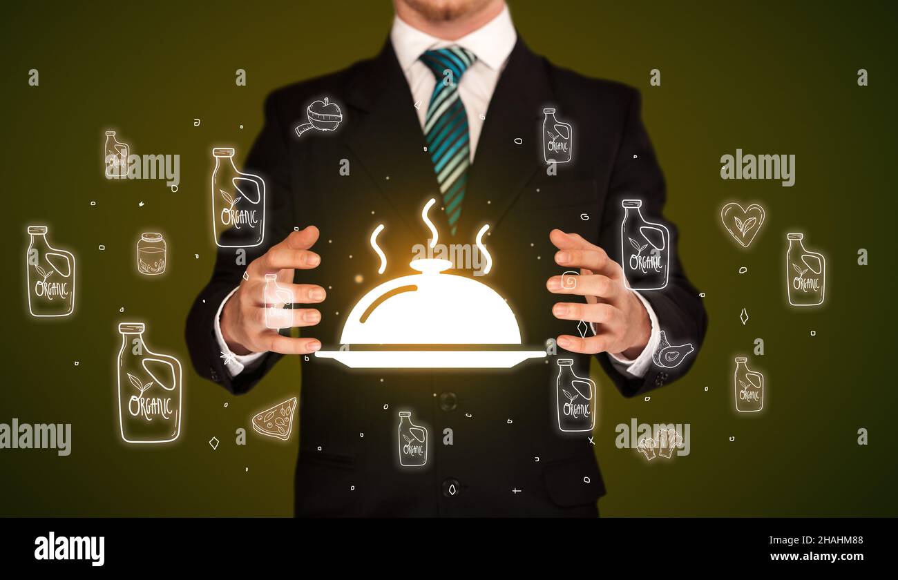 Hand holding food related icons Stock Photo - Alamy