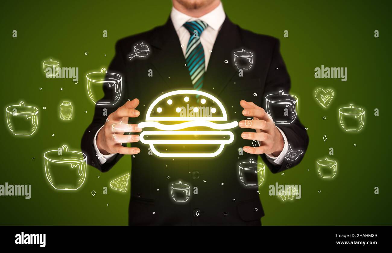Hand holding food related icons Stock Photo - Alamy