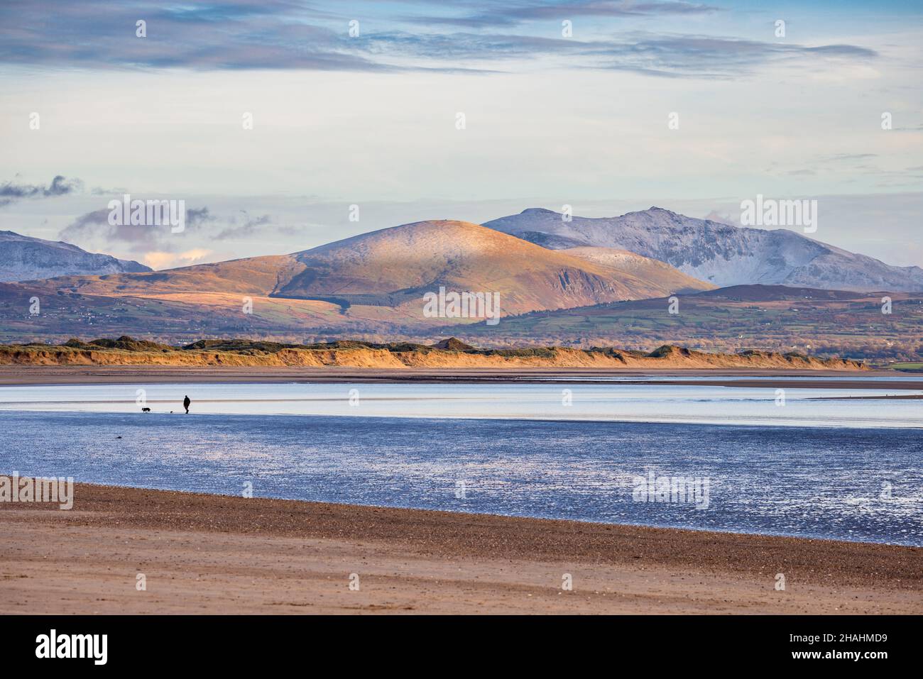 Mount Snowdon and the Snowdonia mountains from Newborough Beach in the ...