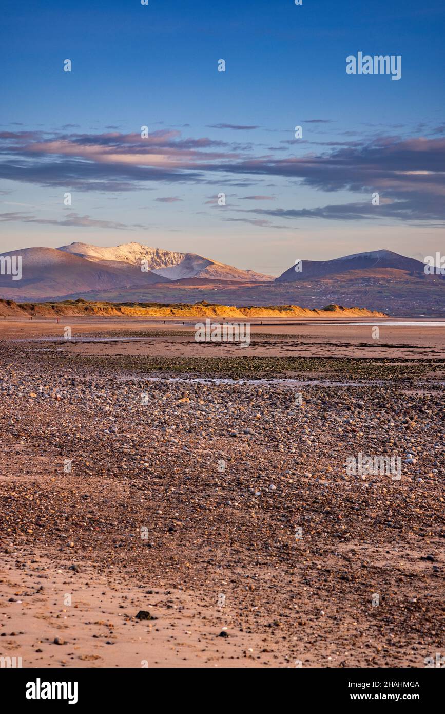 Mount Snowdon and the Snowdonia mountains from Newborough Beach in the ...