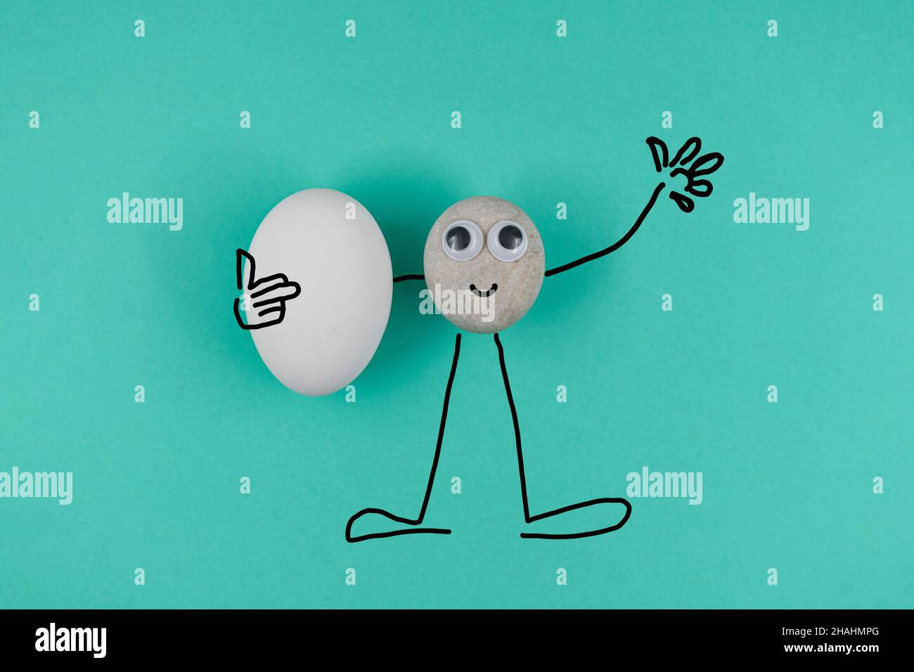 Animated pebble with a happy face, greeting all and holds one clear ...