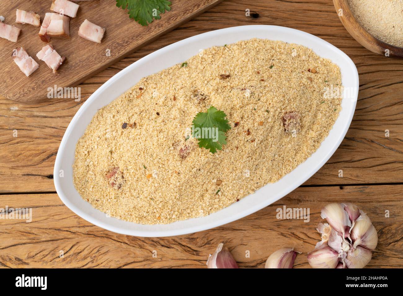 Farofa, typical brazilian manioc flour side dish with seasonings Stock ...